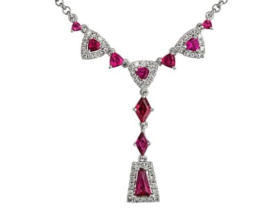 Bixbite In Rhyolite Gem Guide and Properties Chart | Gemstones.com